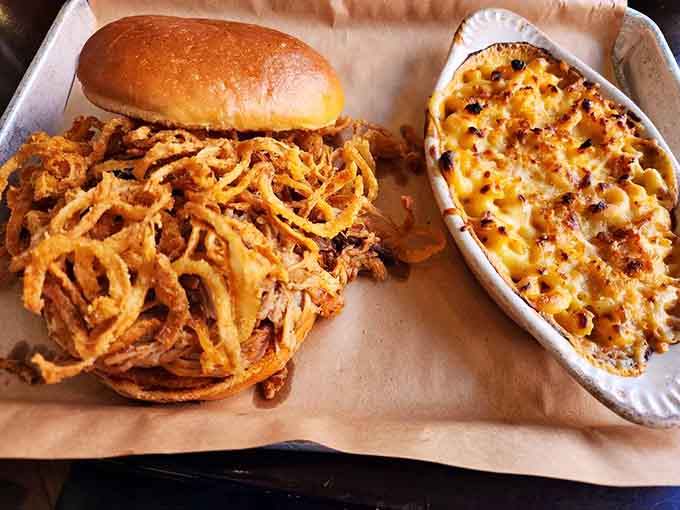 Pulled pork with crispy onion strings next to baked mac and cheese is the kind of lunch that requires a nap afterward.