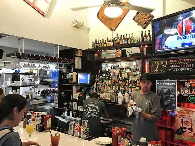 The bar area stocks enough bottles to make any brunch feel like a proper celebration of survival.