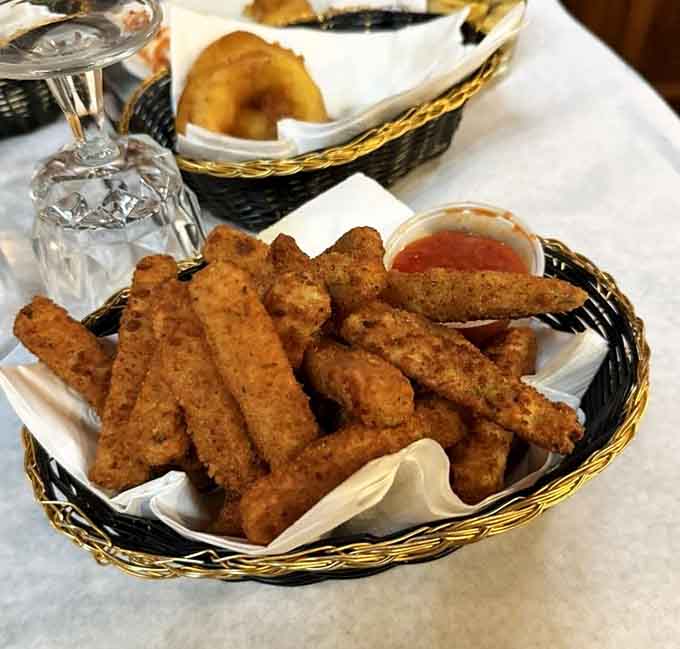 Crispy zucchini sticks in a basket, the kind of appetizer that disappears faster than your diet plans.