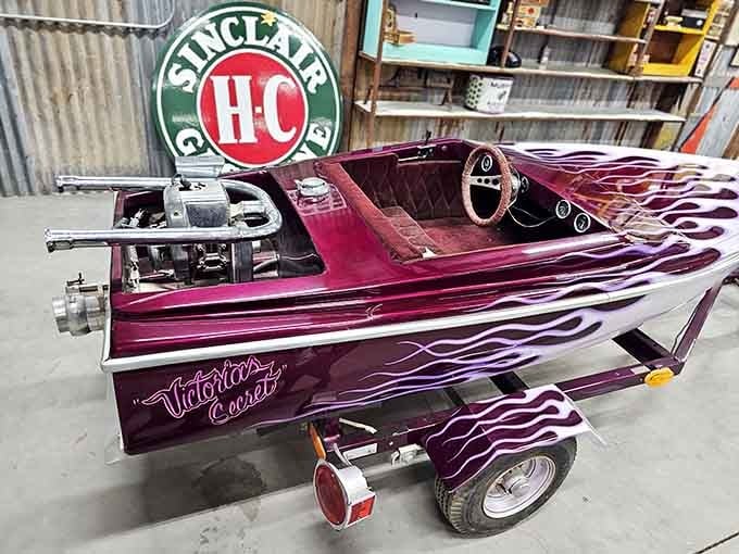 When a boat decides it wants flames and a trailer, you get this purple masterpiece of aquatic ambition.