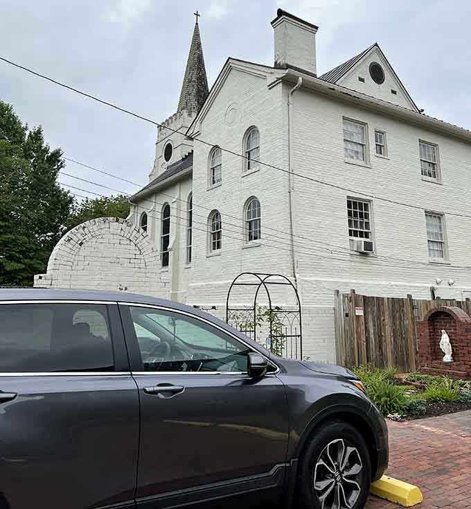 St. Ann Catholic Church stands white and proud, making every other building look slightly underdressed by comparison.
