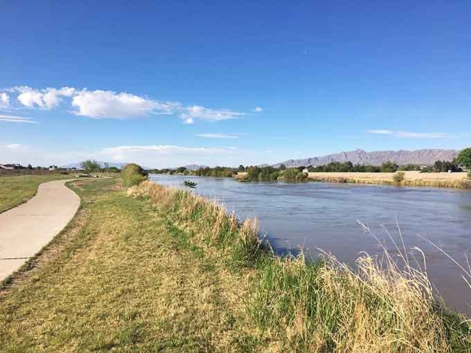 The Rio Grande Riverpark offers peaceful walking paths where nature and city life shake hands and get along.
