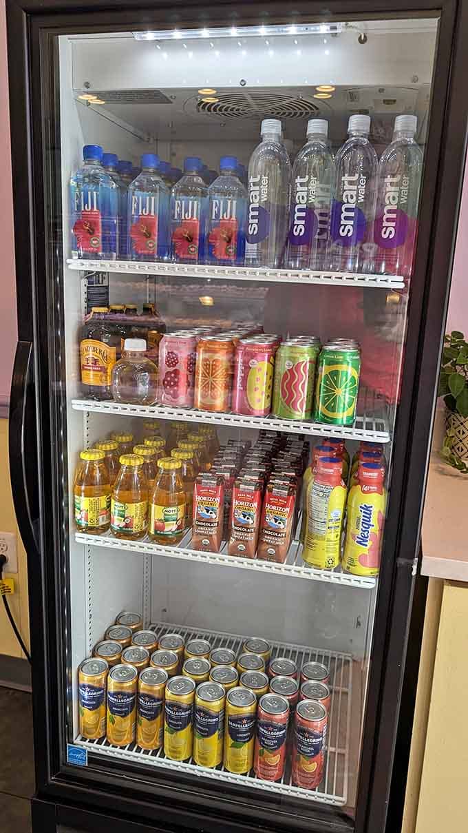 The beverage cooler offers everything from smart water to colorful drinks that look like liquid happiness in cans.