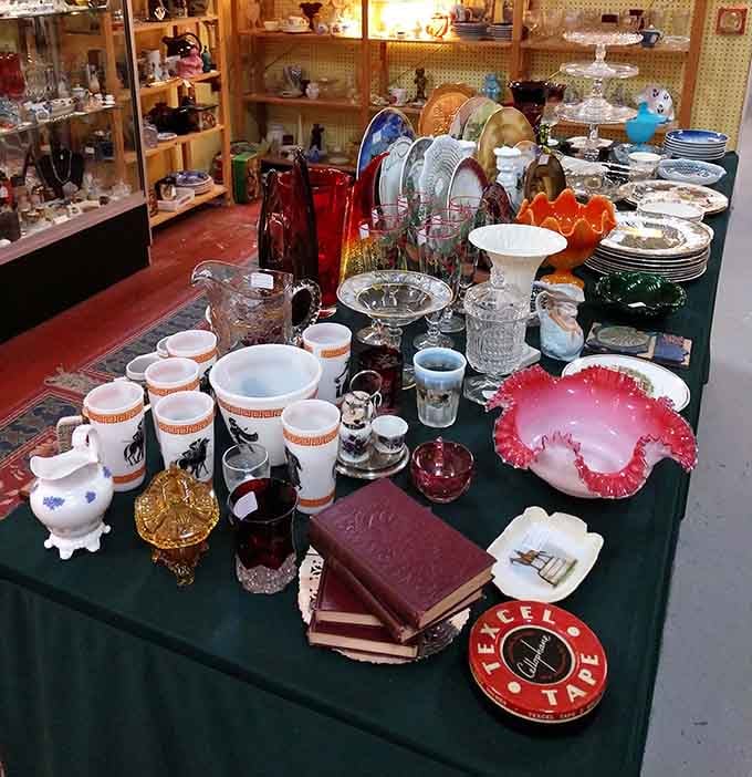 Glassware and china stacked with precision that would make Martha Stewart weep tears of organizational joy.