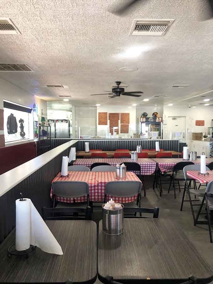 Red-checkered tablecloths and ceiling fans create that classic barbecue joint vibe that never goes out of style or fashion.