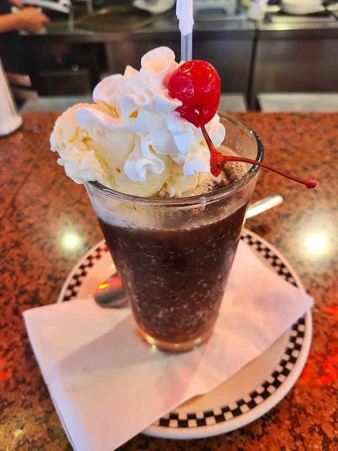 That chocolate float topped with whipped cream and a cherry is basically a liquid hug in a glass.