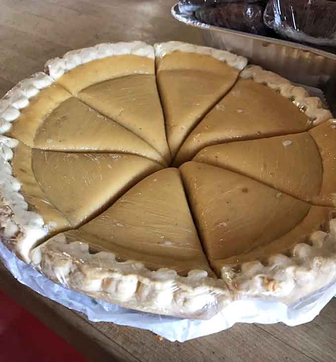 Sweet potato pie sliced and ready to make you forget every diet you've ever considered starting.