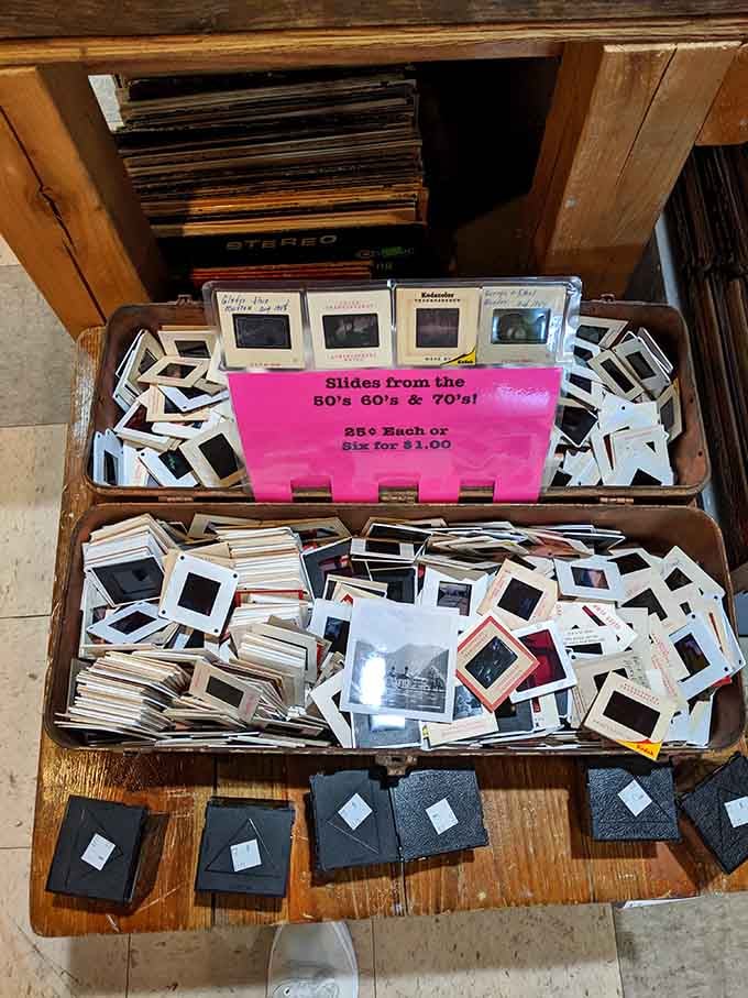 Boxes of vintage photographic slides from the '50s through '70s, offering glimpses into strangers' vacations and family gatherings past.