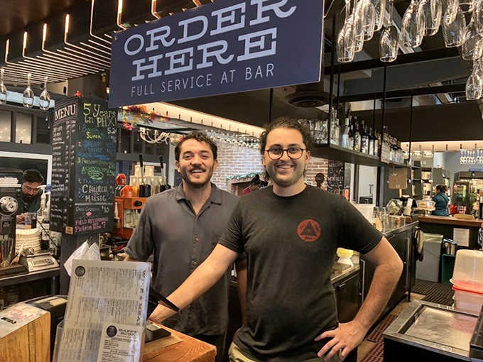 The friendly faces behind the bar who'll guide you to your next great read and perfect pour.