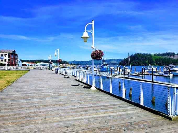 The boardwalk where morning coffee tastes better and boats bob peacefully like they've got nowhere important to be.