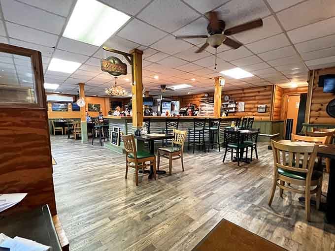 More wooden tables and mismatched chairs creating that authentic diner vibe that can't be manufactured or faked.