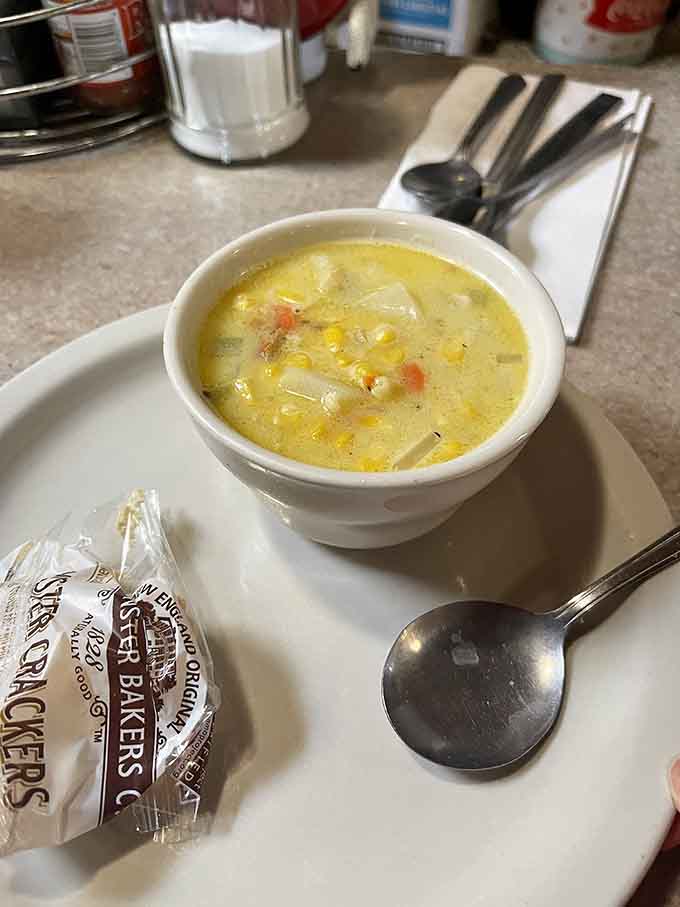 Creamy corn chowder studded with vegetables offers comfort in a bowl, perfect for those mornings when soup just sounds right.