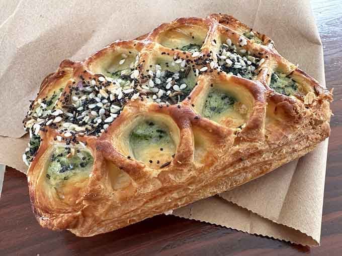 Flaky pastry meets spinach and feta in this savory Danish that's basically a hug in baked form.