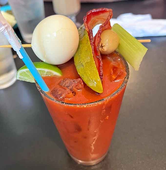 This Bloody Mary comes so loaded with garnishes it's basically a salad, a cocktail, and an appetizer having a party.
