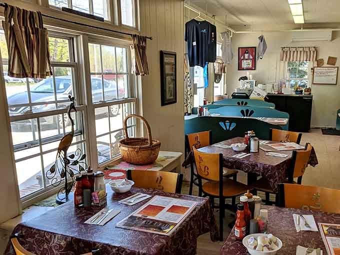 Sunlight streams through windows onto tables set and ready, waiting to host another round of satisfied breakfast enthusiasts.