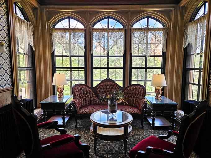 Sunlight streaming through those magnificent windows transforms an ordinary sitting room into something positively regal and inviting.