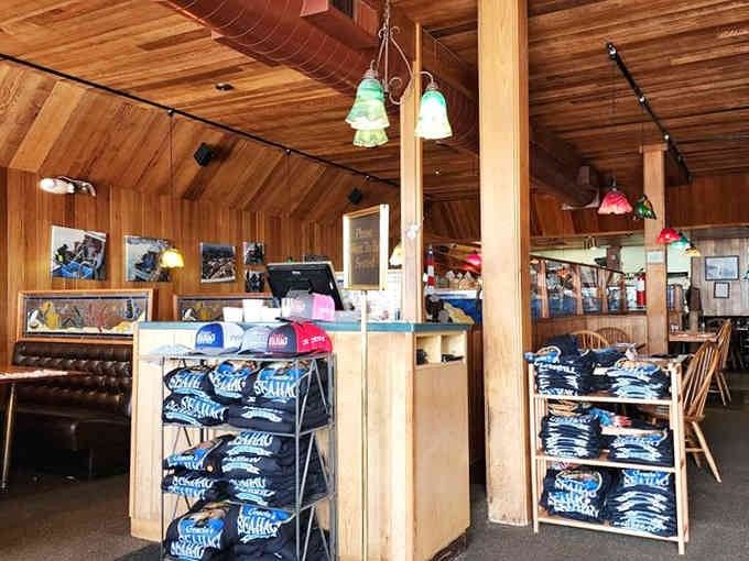 Wood paneling, pendant lights, and stacks of Sea Hag swag prove this place has serious hometown pride.