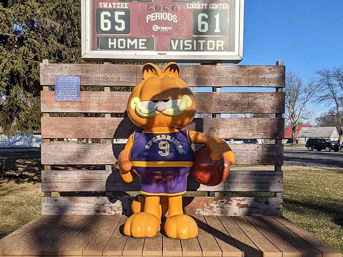 This basketball-playing feline proves that even lazy cats can occasionally pretend to enjoy athletic pursuits occasionally.