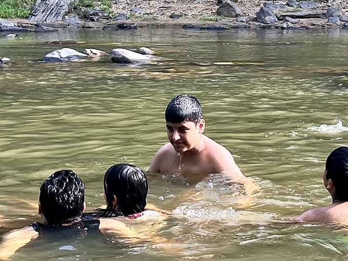 Summer swimming holes where kids can actually be kids, splashing around without a screen in sight for hours.