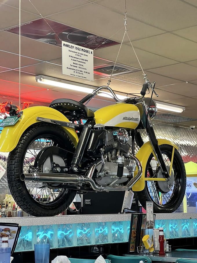 That's a 1952 Harley-Davidson Model K hanging above the counter, because regular decor is for regular diners.