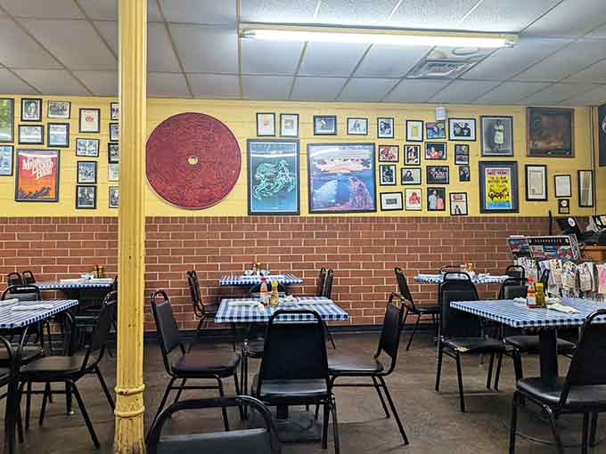 Every inch of wall space tells a story, making this dining room feel like eating inside a scrapbook.