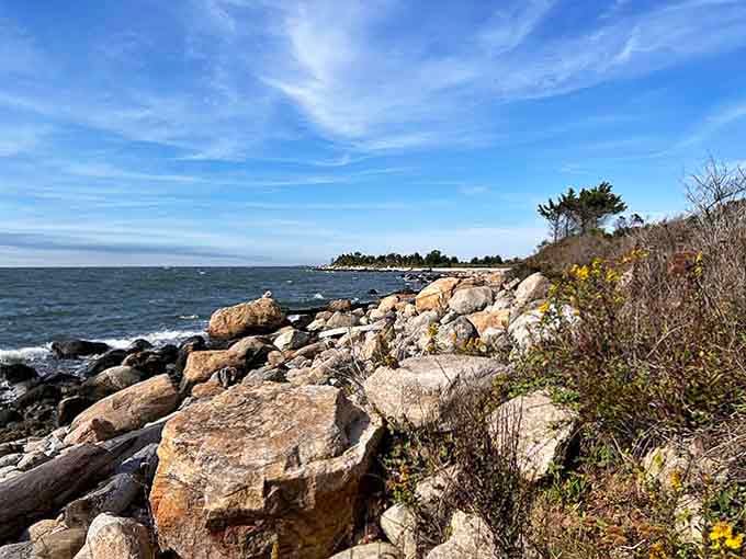 Rocky outcrops where fishermen contemplate life's mysteries while pretending they're actually catching something substantial.