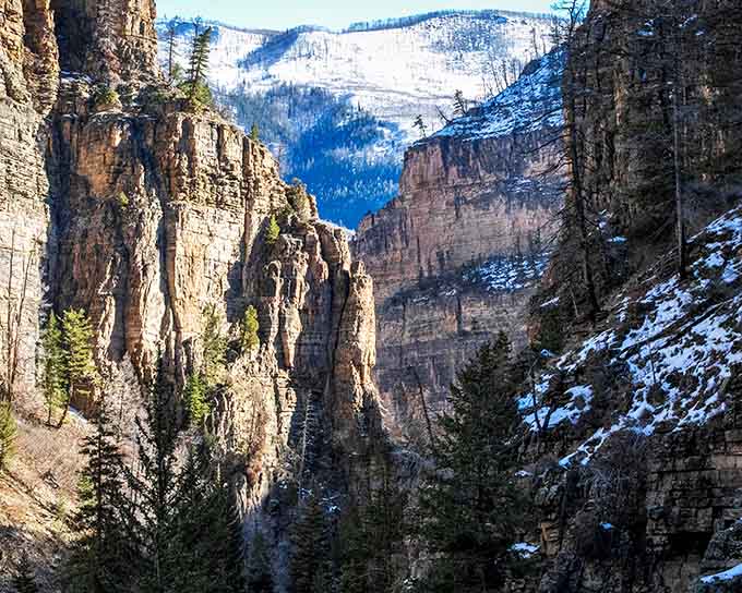 Glenwood Canyon's dramatic walls frame your journey like nature's own IMAX theater experience.