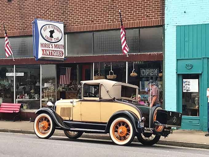 Colorful vintage cars cruise past during a community celebration, when Hazel's streets become a candy-colored parade of nostalgia.