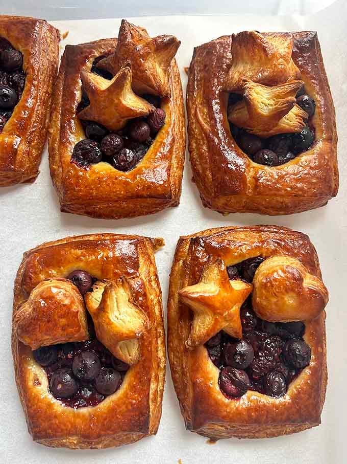 Danish pastries topped with berries and stars, because your breakfast deserves to feel fancy sometimes.
