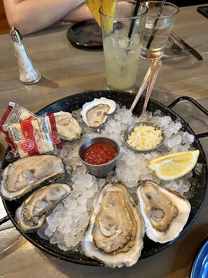 Fresh oysters on ice look like edible pearls, waiting patiently for their moment of glory and a squeeze of lemon.