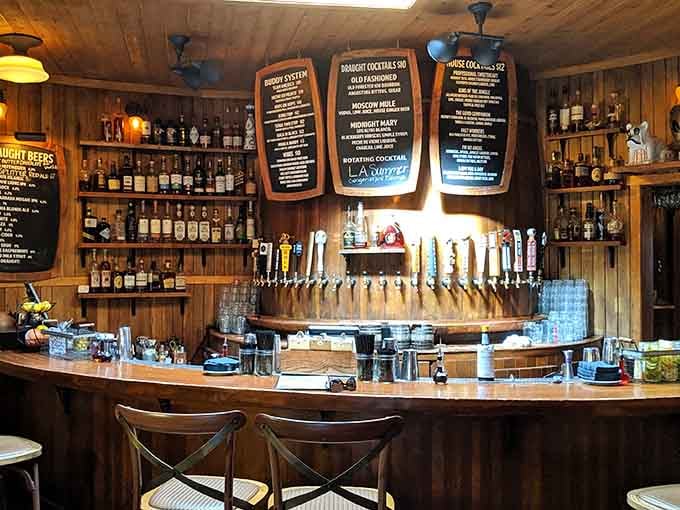 A well-stocked bar inside a barrel&mdash;it's almost too perfect, like someone granted a very specific architectural wish.