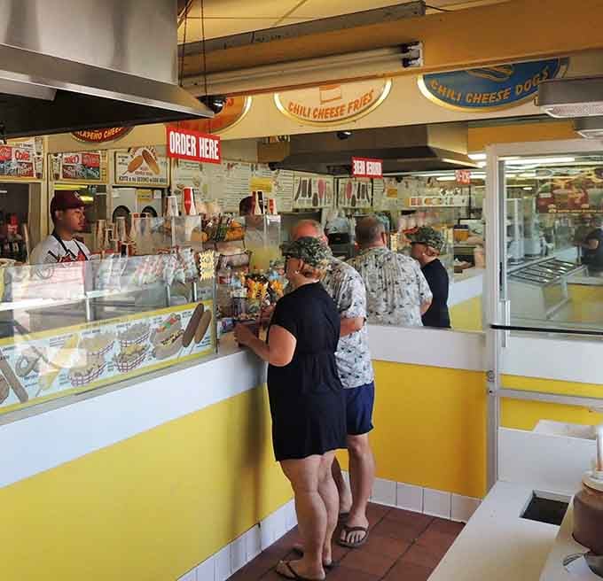 The line moves fast, but nobody minds waiting when corn dog paradise is just moments away.