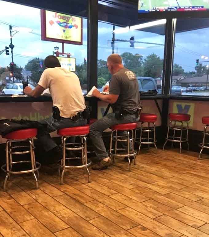 Two locals enjoying their meal by the window, living proof that Joey's is where neighbors become regulars quickly.