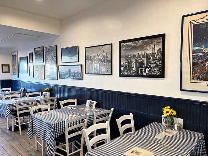 Black and white photographs line the walls, adding character without overwhelming the clean, welcoming space throughout.