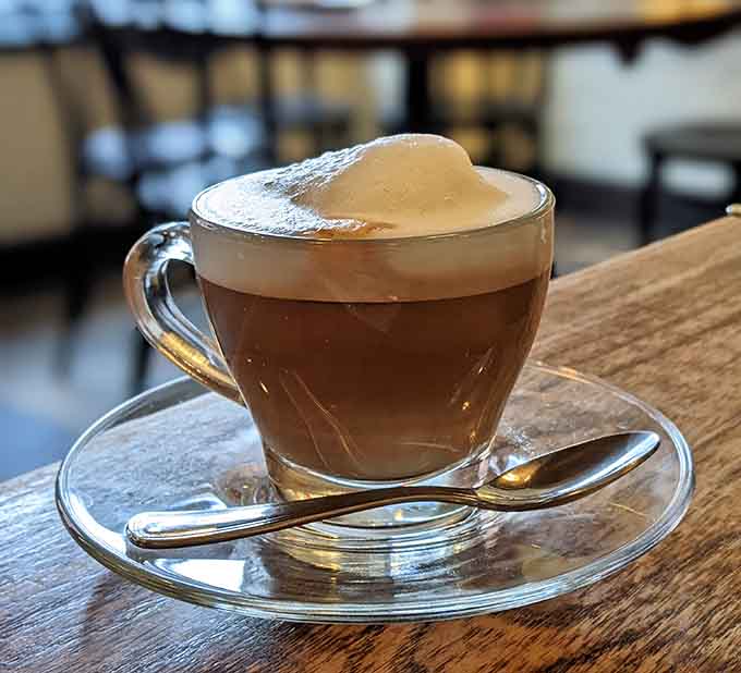 A perfectly layered cappuccino that looks almost too beautiful to drink, but you absolutely will.