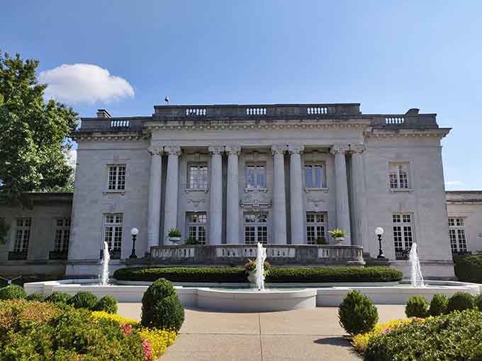 Classical columns and manicured gardens showcase the elegance befitting Kentucky's executive residence since the 1910s.