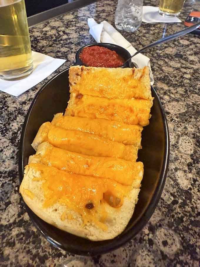 The bar area features plenty of tap handles and that classic neighborhood pub vibe everyone secretly craves sometimes.