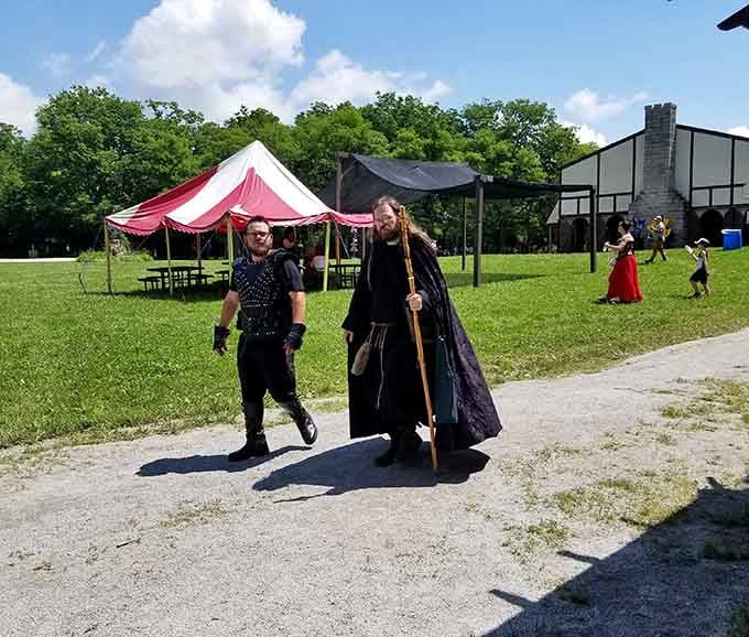 Costumed characters stroll the pathways in full medieval regalia, transforming ordinary fairgoers into time travelers for the day.
