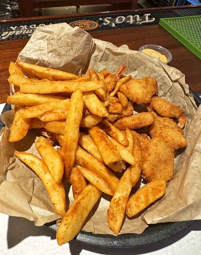 Fish and chips done right, with golden fried seafood and perfectly seasoned fries that'll make you forget every mediocre version you've ever had.