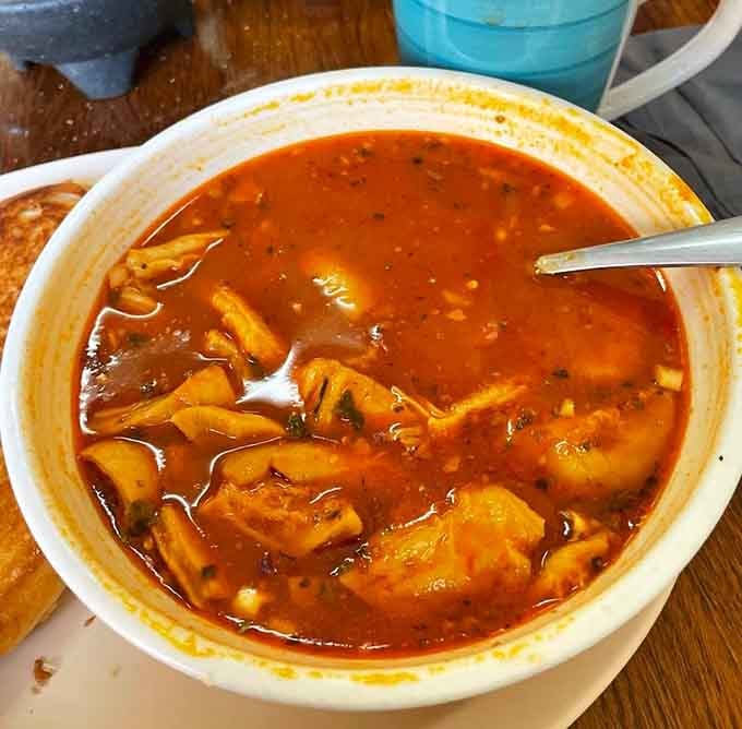 The menudo offers traditional comfort in a bowl, perfect for weekend mornings when you need something hearty.