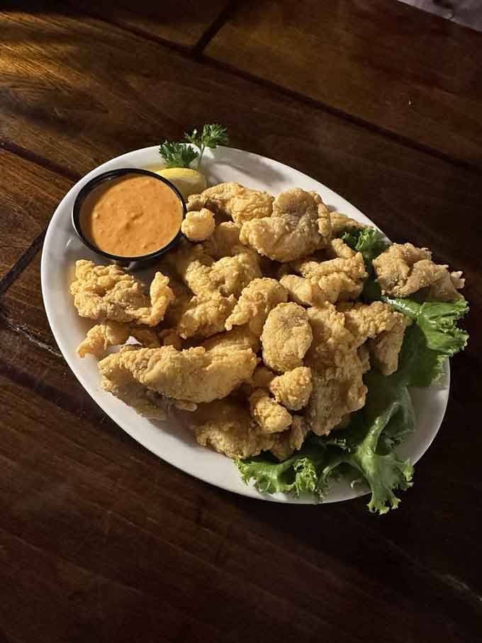 Golden catfish chips with remouade sauce deliver that satisfying crunch and spice combination your taste buds have been craving.