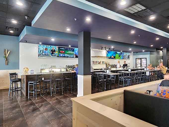 Clean lines and comfortable seating create a welcoming space where the focus stays squarely on exceptional seafood and conversation.