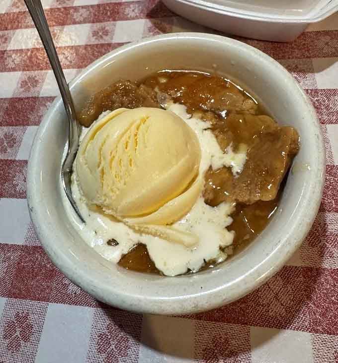 Warm peach cobbler topped with vanilla ice cream&mdash;the perfect sweet ending to a meal you'll be talking about for weeks.