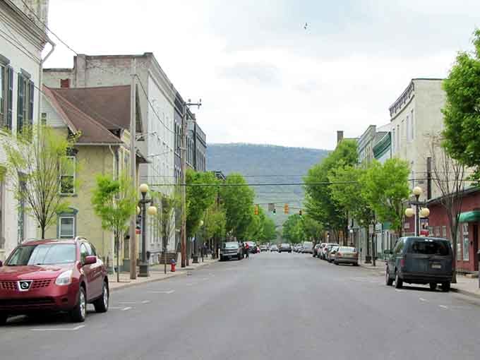 Main Street views framed by mountains that make you wonder why anyone pays premium for lesser scenery elsewhere.