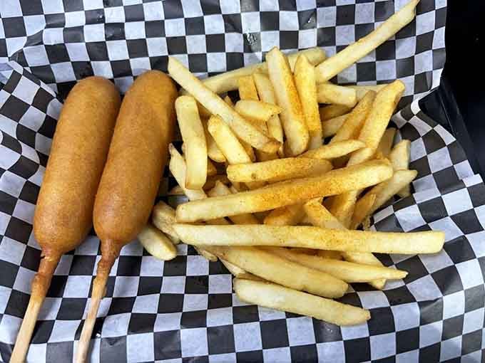 Corn dogs and fries served on checkered paper: proof that some classics never need updating or improvement.
