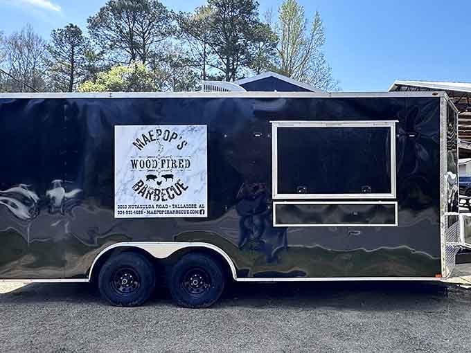 The sleek black food truck means this exceptional barbecue can show up anywhere, like a delicious superhero answering the call of hungry folks across town.