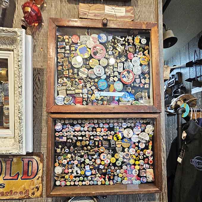 Hundreds of pins create a mosaic of Americana, each one a tiny time capsule from roadside attractions past.