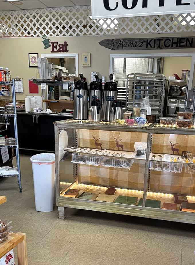 The counter area where magic happens: coffee brewing, treats displayed, and decisions becoming delightfully impossible to make.
