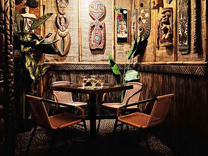Tiki masks watching over your meal like friendly Polynesian guardians with excellent interior design taste.
