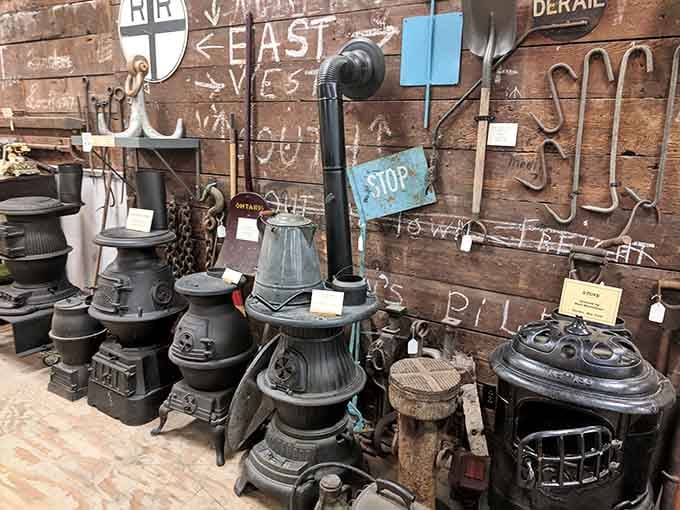 These cast-iron pot-belly stoves kept depot workers warm during brutal winters, no central heating complaints allowed back then.
